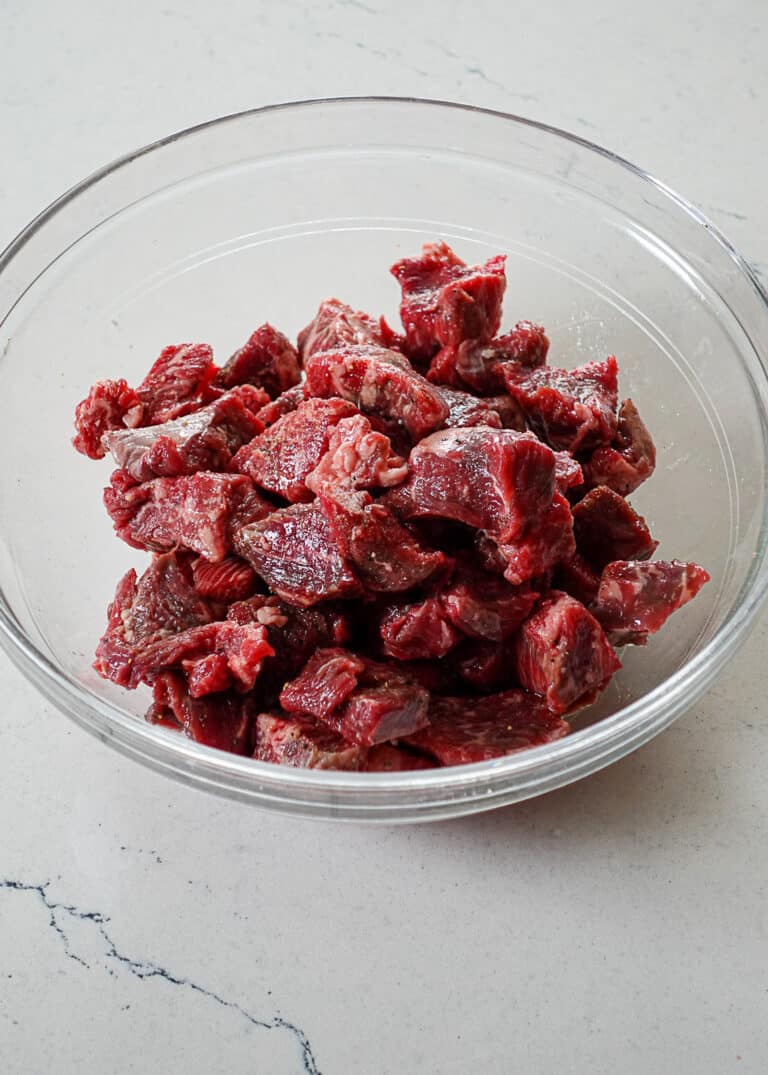 Hearty Dutch Oven Beef Stew Recipe - Sip Bite Go