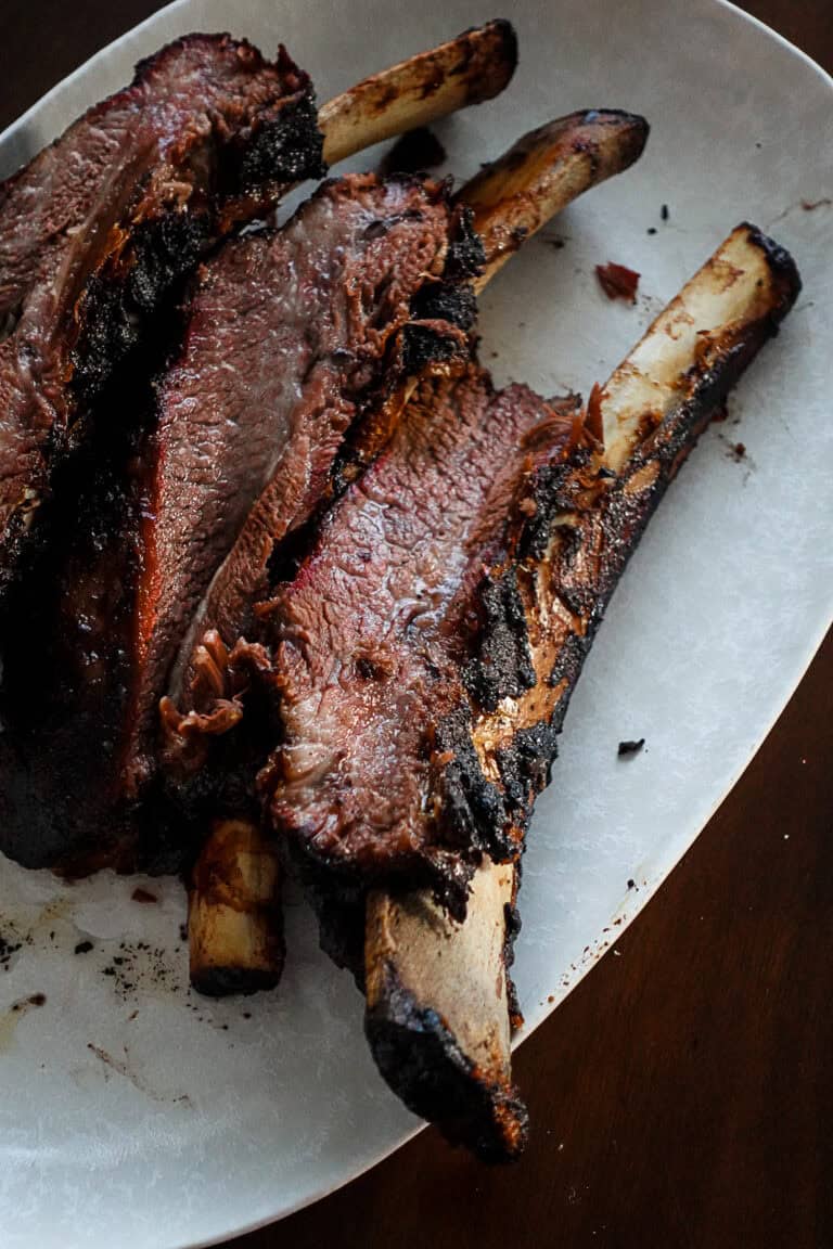 How To Smoke Dino Ribs on Traeger (Beef Plate Ribs) - Sip Bite Go