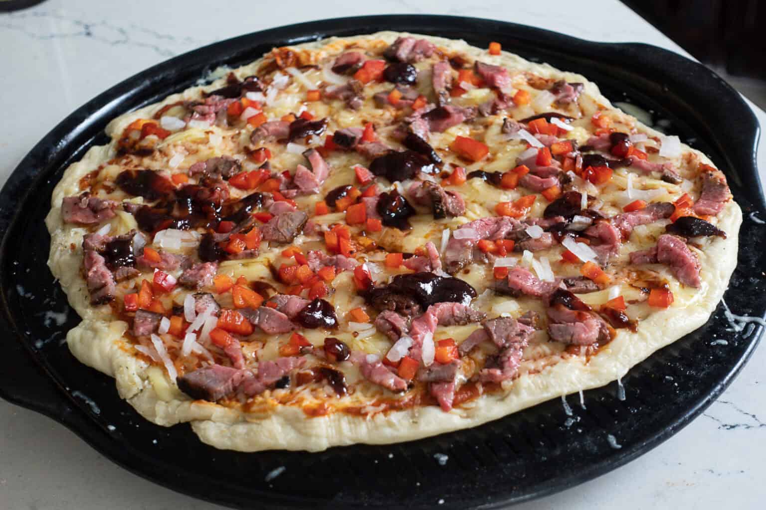 Traeger BBQ Smoked Tri Tip Pizza - Sip Bite Go