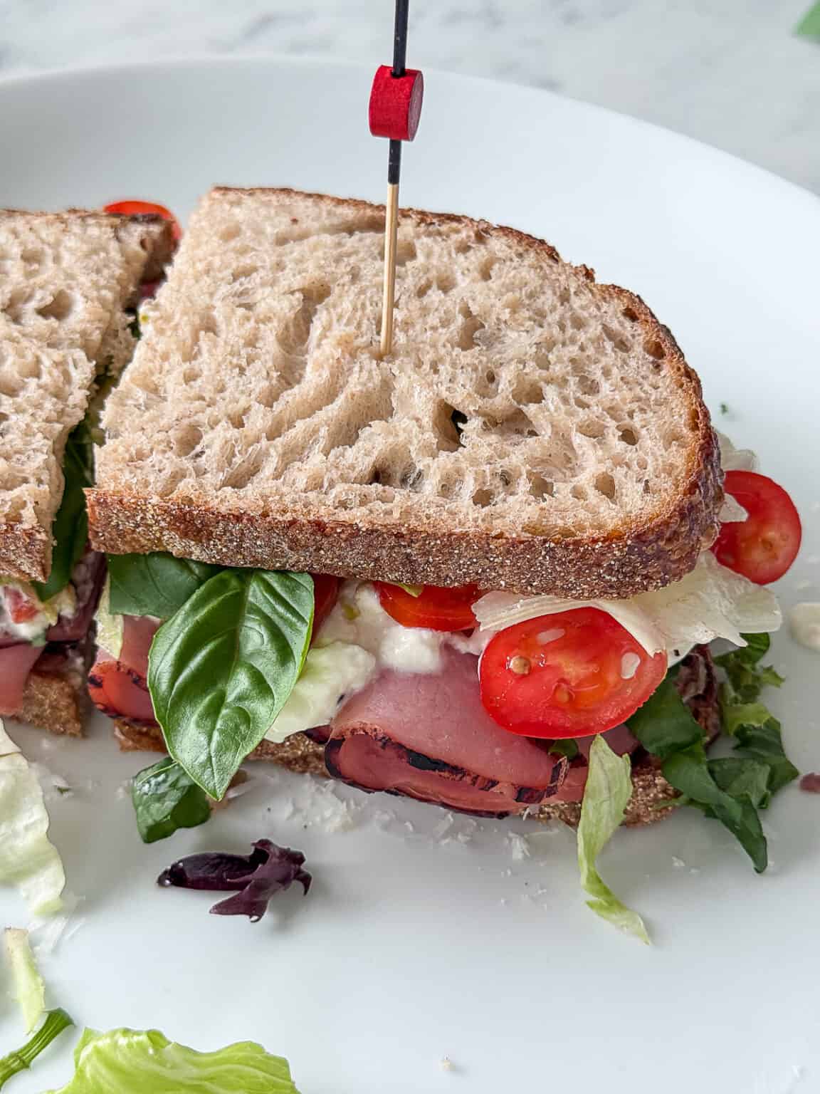 Gourmet Ham Sandwich with Burrata and Muffuletta Olive Salad - Sip Bite Go