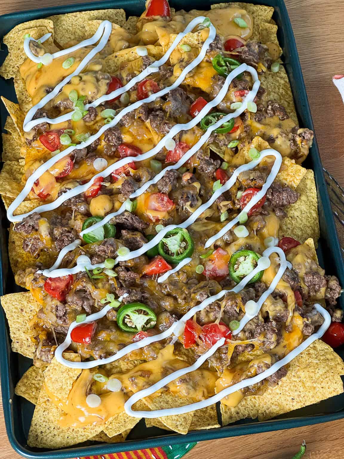 Viral Sheet Pan Nachos With Sliding Cheese - Sip Bite Go